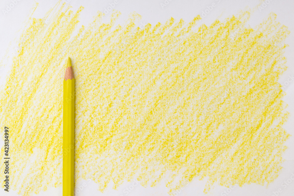yellow pencil on a yellow hatched background copy the space. yellow ...