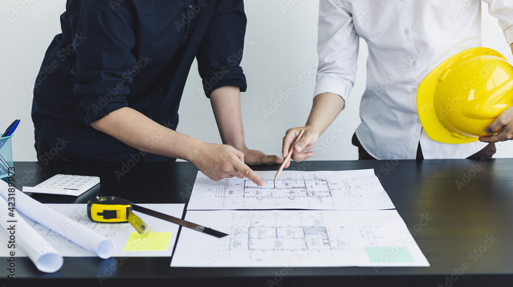 Meeting of engineers and architects in building planning, Consulting ...