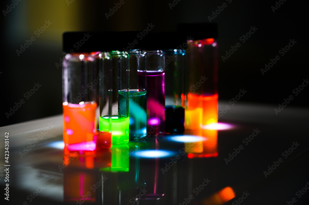 Various colourful analytical sample in glass vial in an inorganic ...