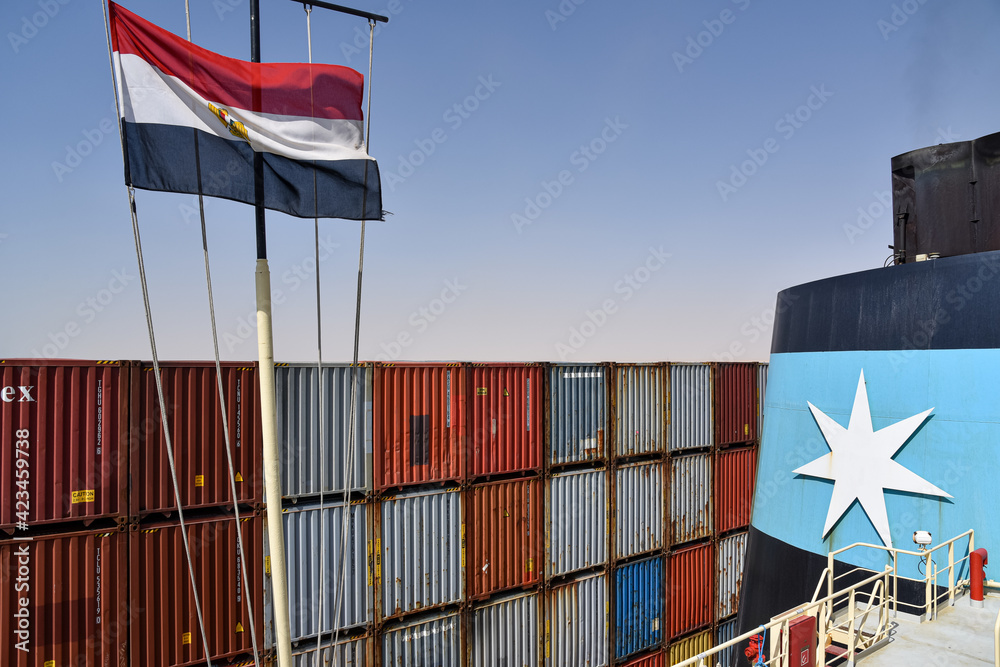 Containers loaded on the cargo ship owned by Maersk Line. Ship sailing ...