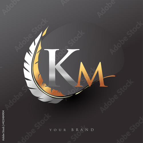 Initial letter KM logo with Feather Gold And Silver Color, Simple and ...