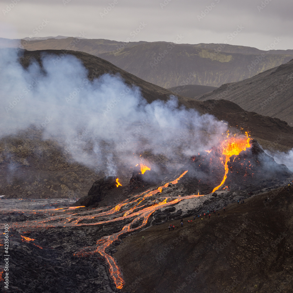 Lava flows from a small volcanic eruption in the Geldingardalur Valleys ...