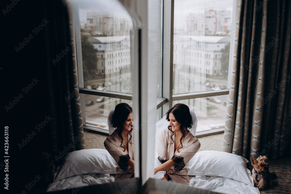 Morning of the bride. The girl in the robe. Glamorous photo session by ...