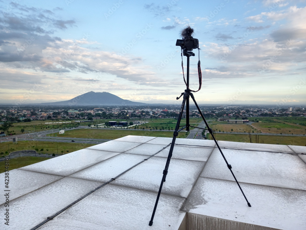 Camera and Tripod on Rooftop Deck with a View of Mt. Arayat (Inactive ...