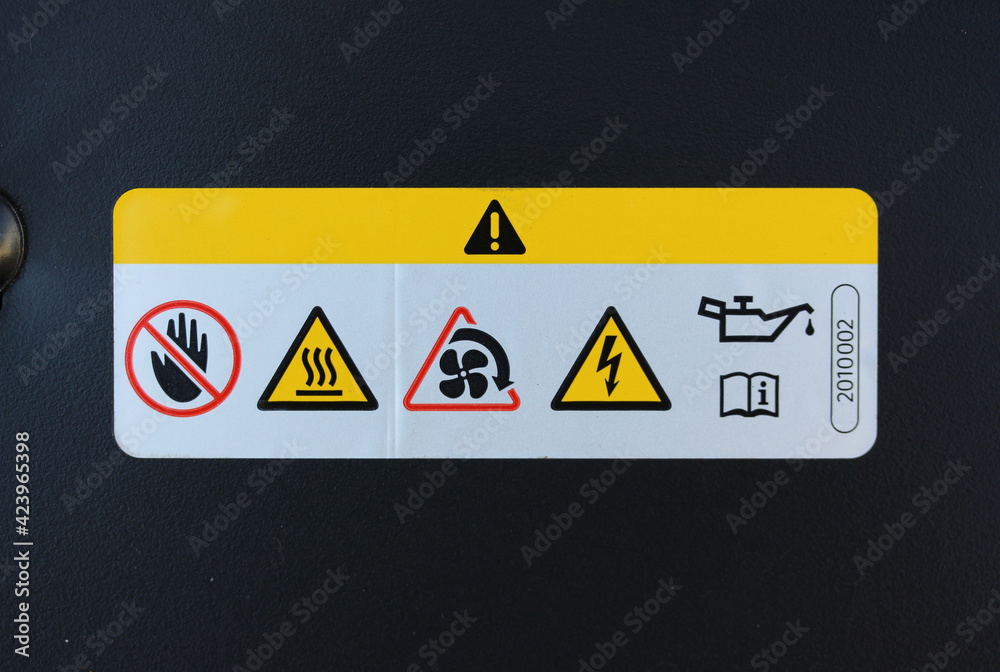 Warning label in new car engine bay Stock Photo | Adobe Stock