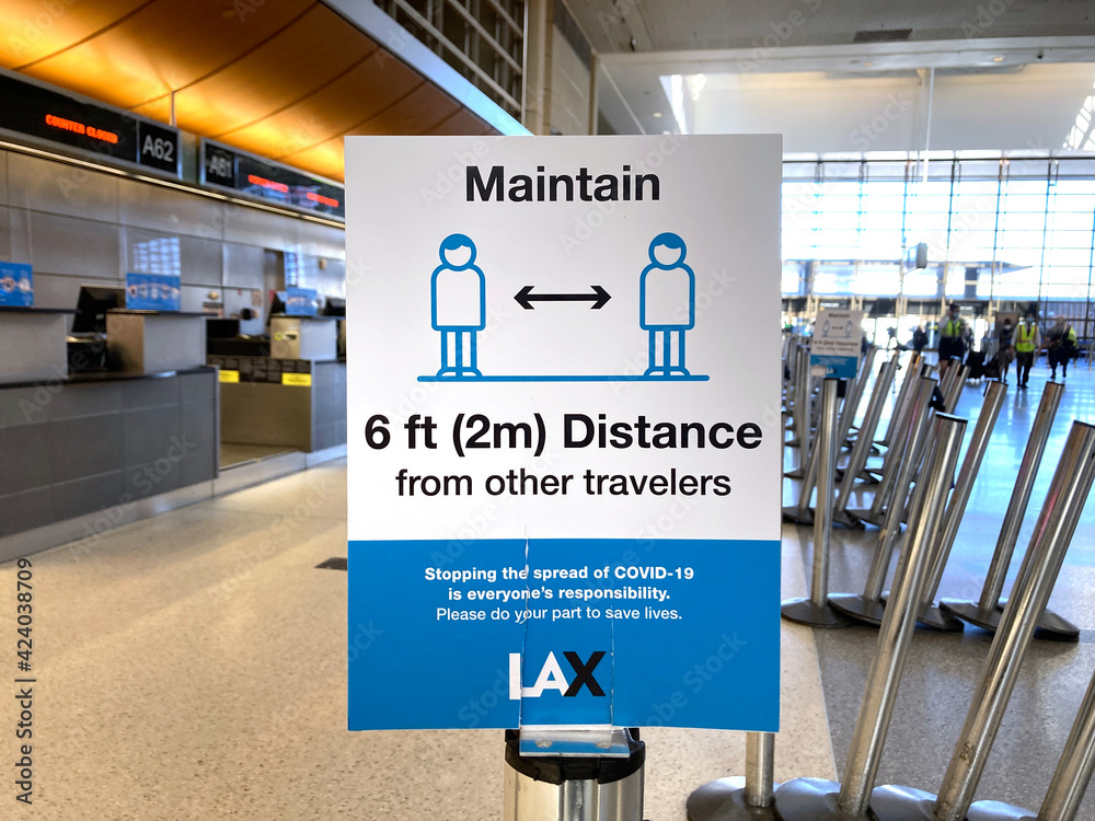 Social Distancing sign in LAX international airport requesting ...