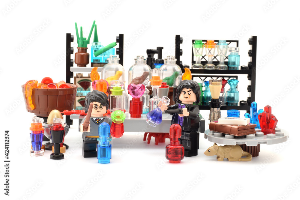 Lego minifigures Harry Potter with magic wand and professor Snape with ...