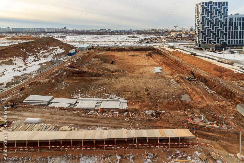 Reinforced concrete piles of new building, tower crane. Hydraulic ...