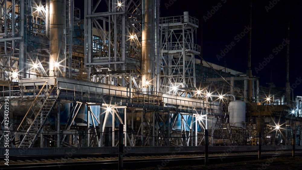 Night industrial petrochemical landscape. Methanol synthesis process ...