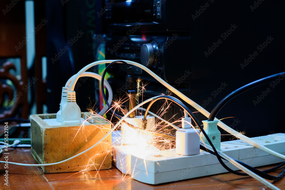 Short circuit, causing a spark to the plug. Using a non-standard power ...