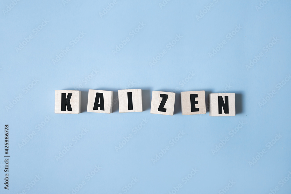Kaizen - words from wooden blocks with letters, a Japanese business ...
