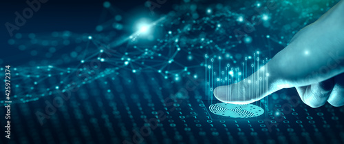 Businessman using fingerprint scan. Fingerprint scan provides access ...