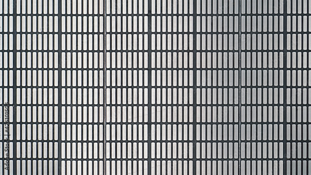 Grid pattern of non-slip metal floor plate in front of escalator, Steel ...