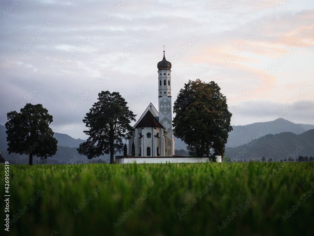 Old historic baroque alpine mountain chapel church St. Coloman at ...