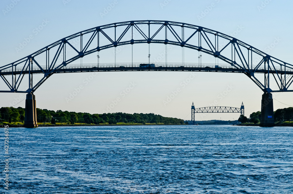 The Bourne Bridge in Bourne, Massachusetts spans the Cape Cod Canal ...
