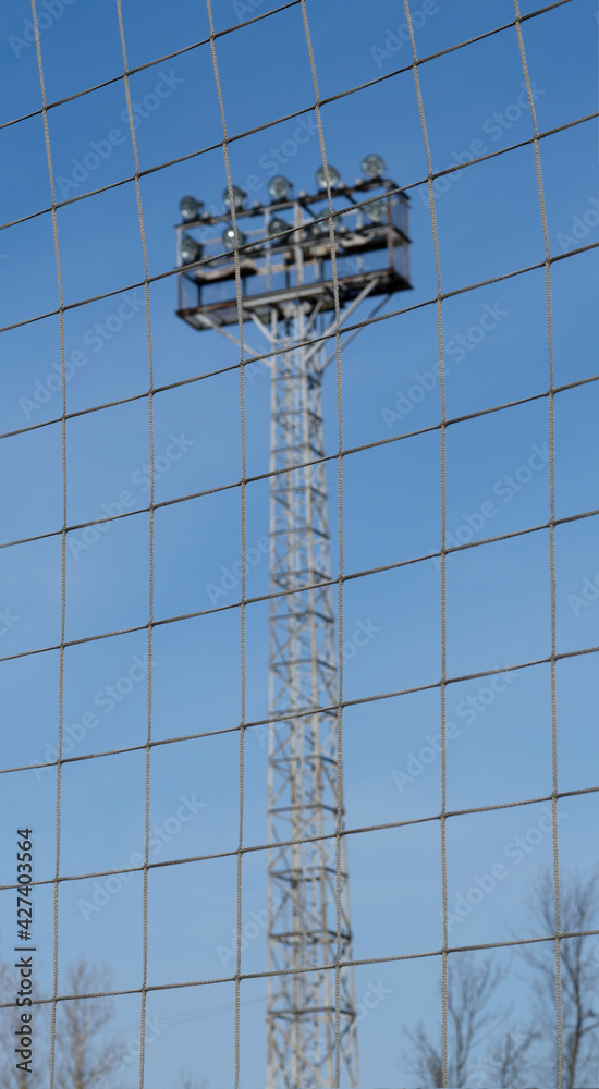 View through the net of a soccer goal, football gate. Bright LED ...