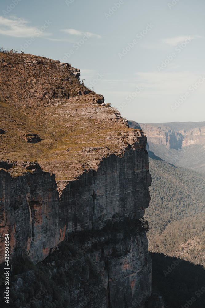 View of the rock faces across the valley from Walls Lookout in the Blue ...