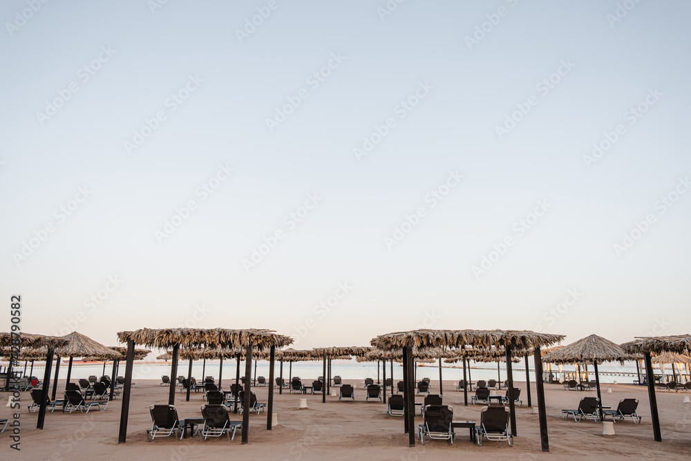 Beautiful lounge pavilion canopy for relax on the beach with sand and ...