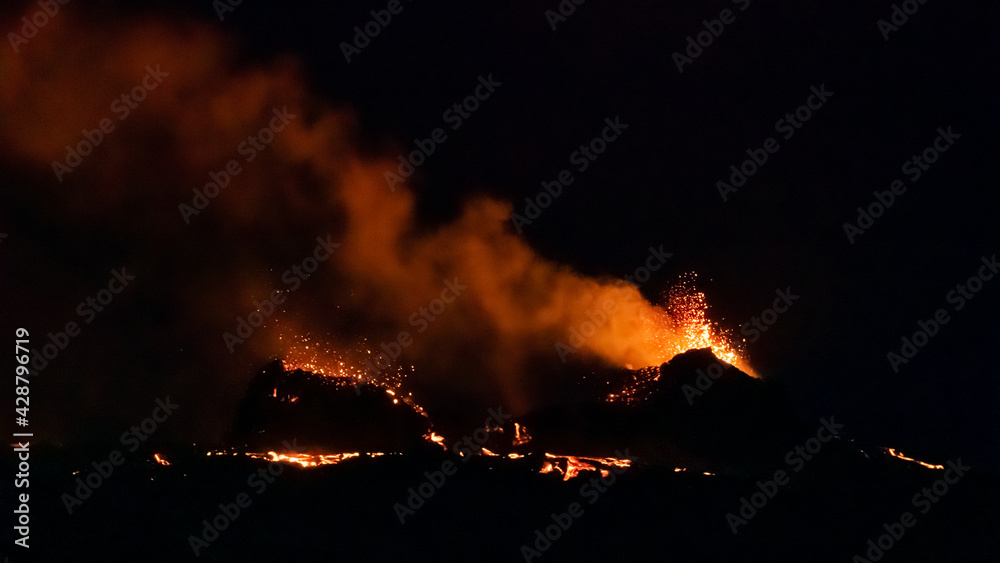 GELDINGADALUR, ICELAND. Erupting Fagradalsfjall volcano at night, 52 km ...