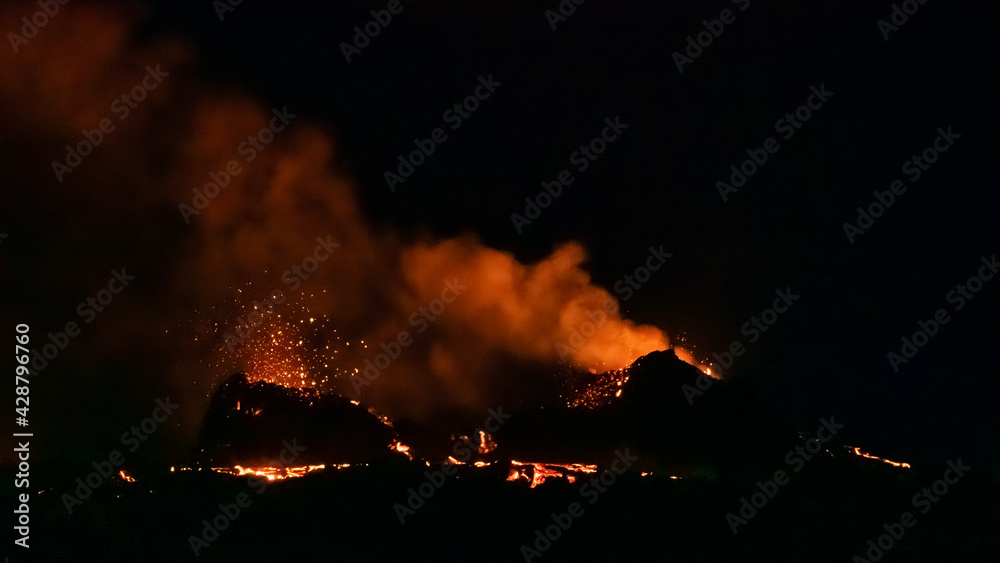 GELDINGADALUR, ICELAND. Erupting Fagradalsfjall volcano at night, 52 km ...