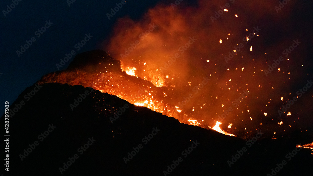 GELDINGADALUR, ICELAND. Erupting Fagradalsfjall volcano at night, 52 km ...