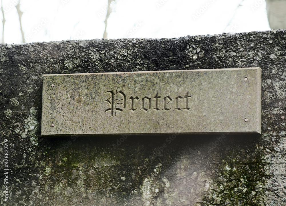 Carved stone old english and german type on A brutalist cold gritty ...