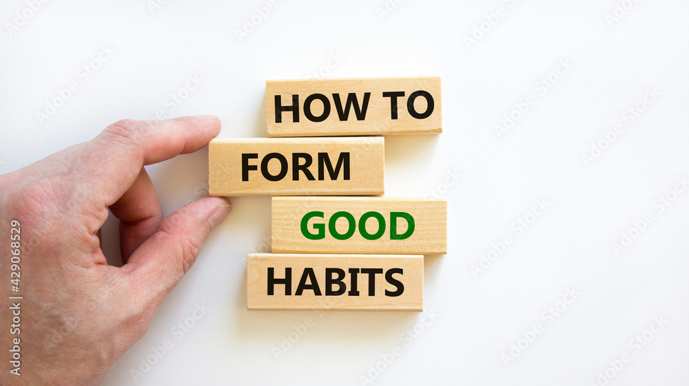Build good habits symbol. Wooden blocks with words 'how to form good ...