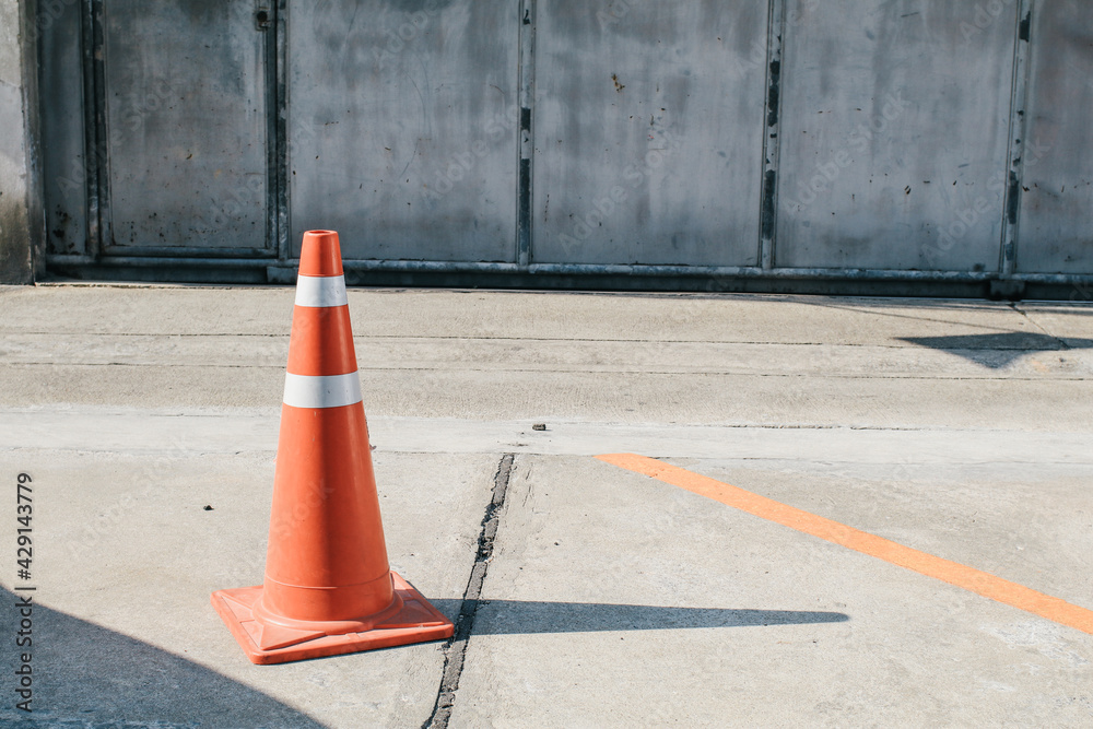 Traffic cone to mark road works or temporary obstruction. Orange ...