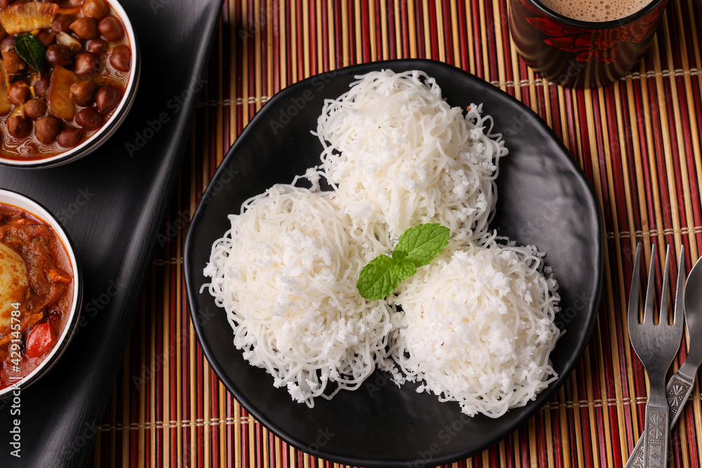 Noolappam/Idiyappam/rice noodles, a popular traditional steam cooked ...