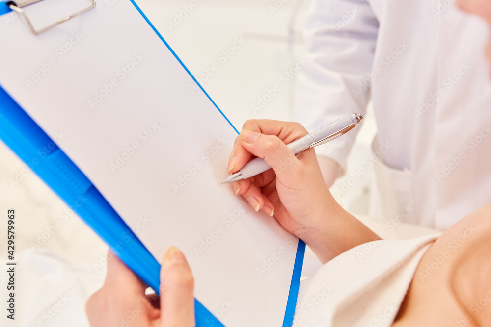 Patient signing a contract Stock Photo | Adobe Stock