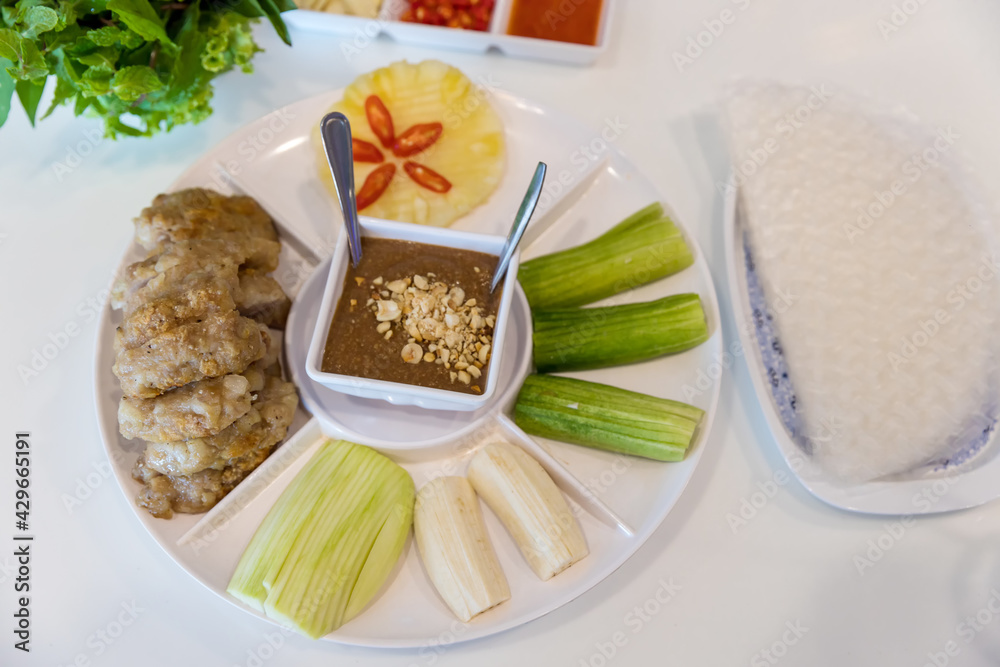 Vietnamese pork meatball with vegetables wraps. Vietnamese food called ...