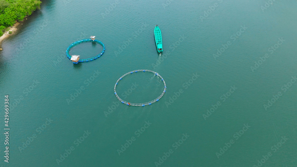 Foto de Stock Fish farm with cages for fish and shrimp in the ...