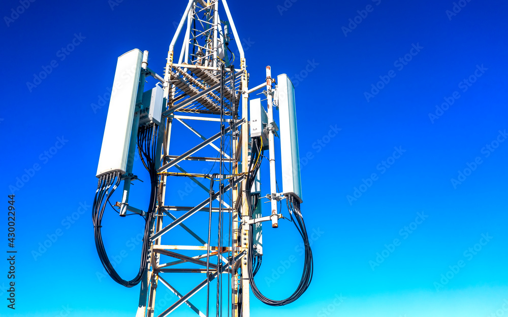 Panel antenna of GSM DCS UMTS LTE bands and radio unit are as part of ...