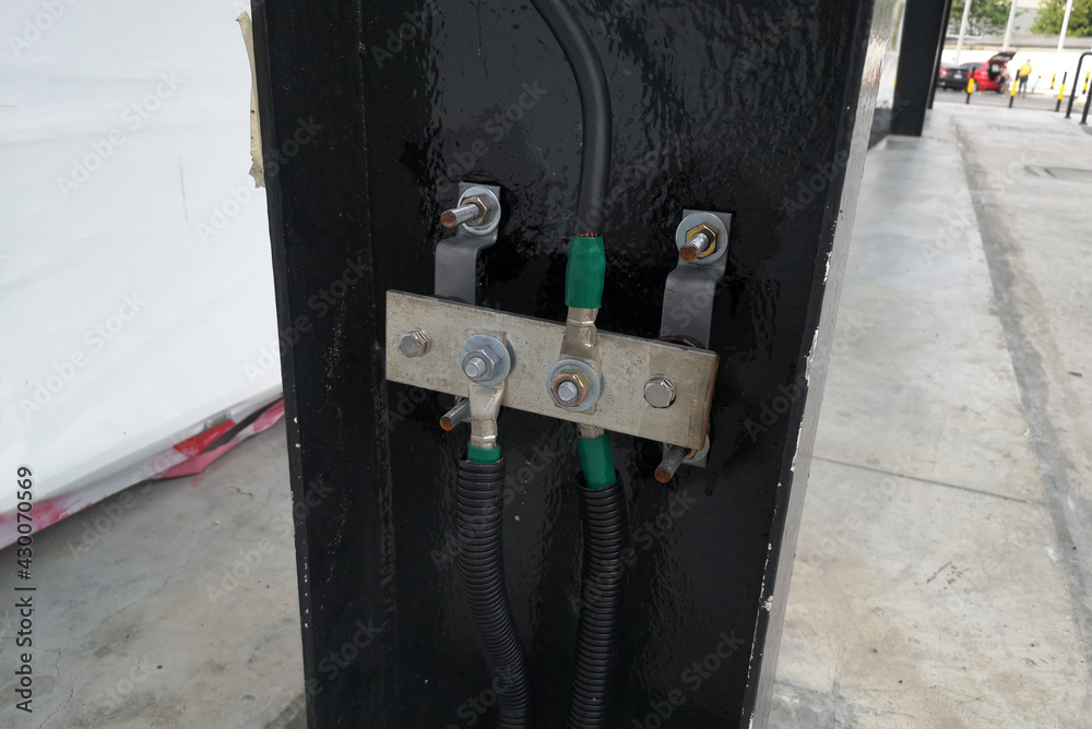 Ground wiring on the bar ground in the pole. Electric grounding. Stock ...