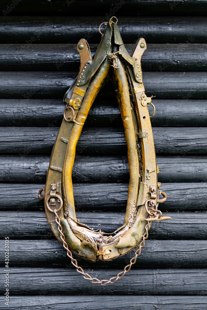 An old yoke for harnessing of draft horses used on a farm. Horse’s yoke ...