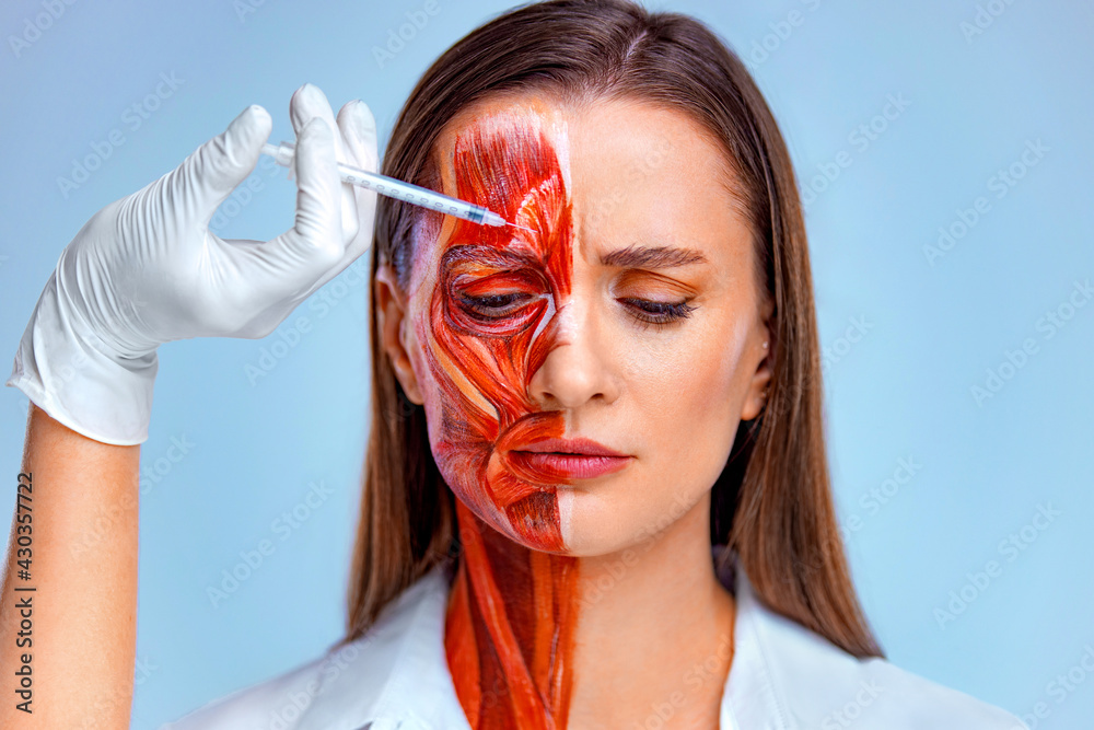 Cosmetic injection in the face. Young woman with half of face with ...
