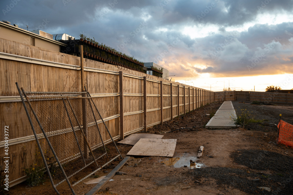 Timber hoarding standing around constriction site. Stock Photo | Adobe ...