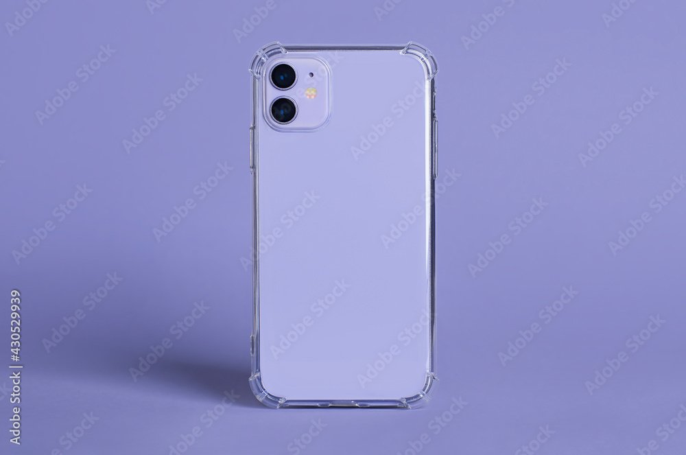 Purple iPhone 11 in clear silicone case back view isolated on purple ...