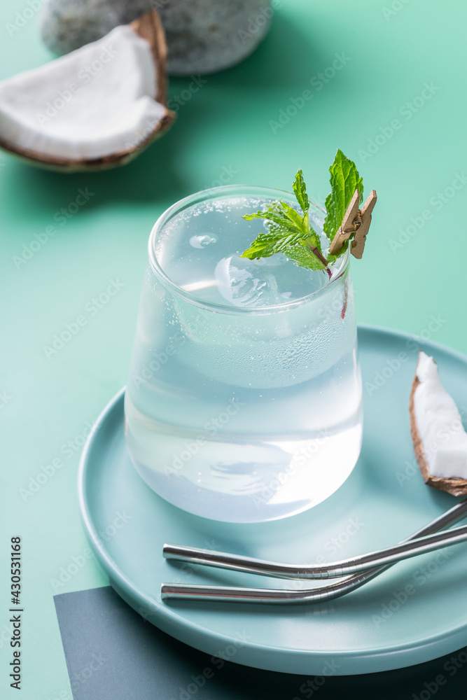 Tropical hard seltzer cocktail with coconut water and ice Stock Photo ...