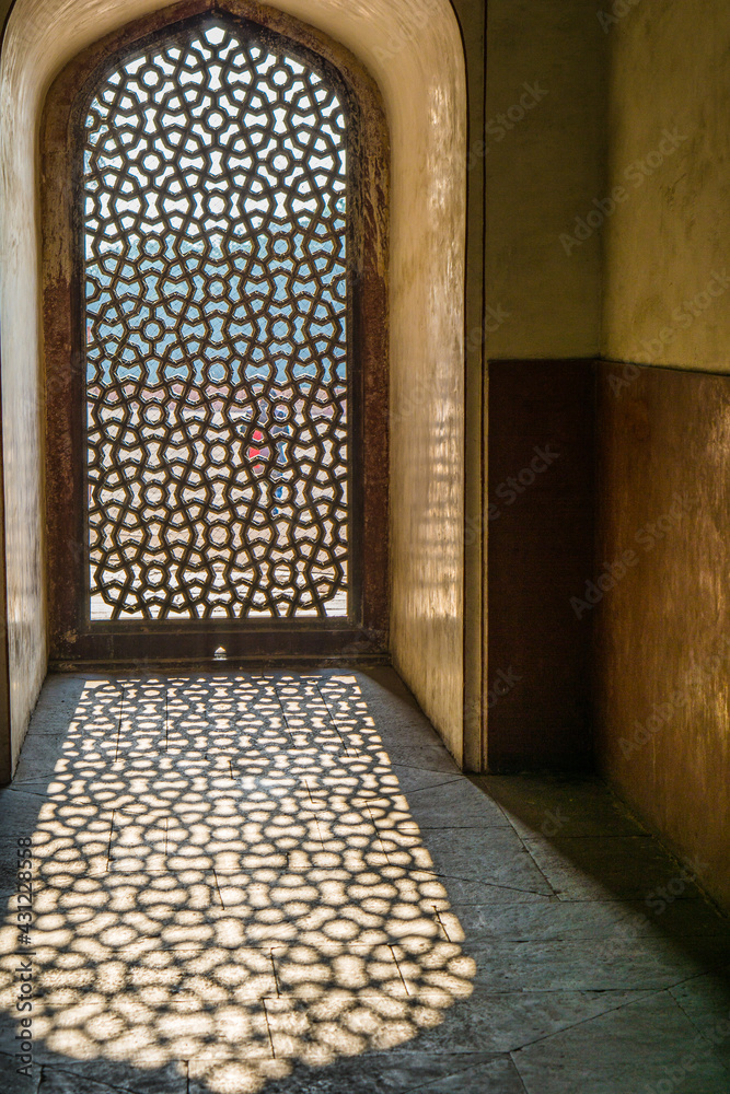 Silhouette Indian old aged terra cotta window screen wall with ...