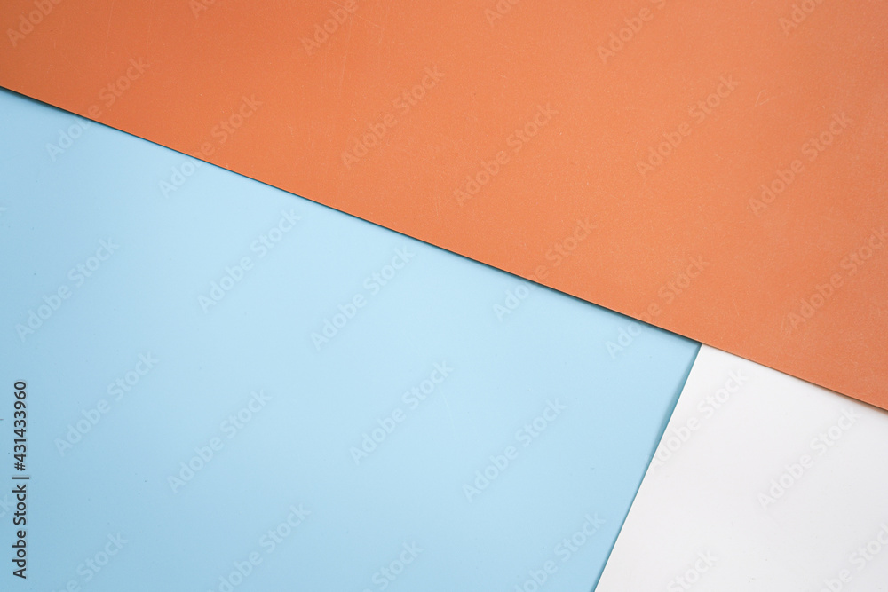 Abstract background of three color paper brown, blue and white paper ...