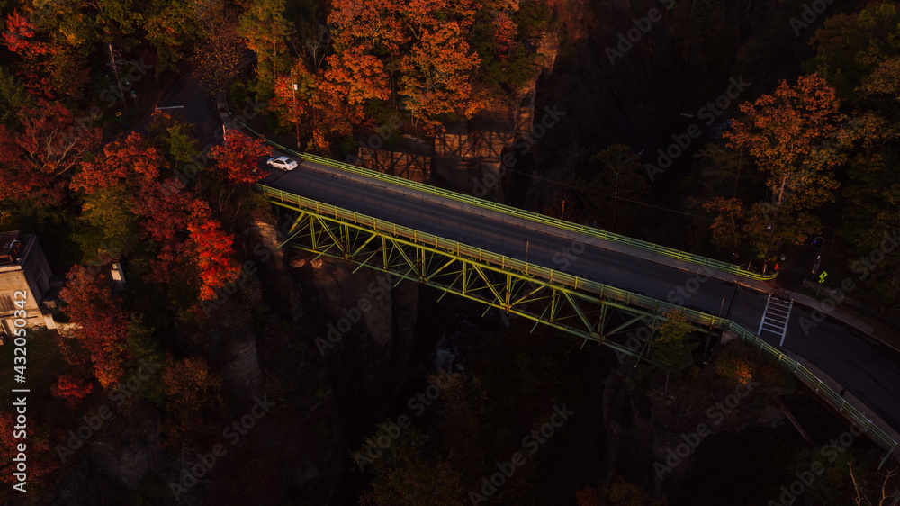 Aerial of Stewart Avenue Deck Truss Bridge over Canyon & Waterfall ...