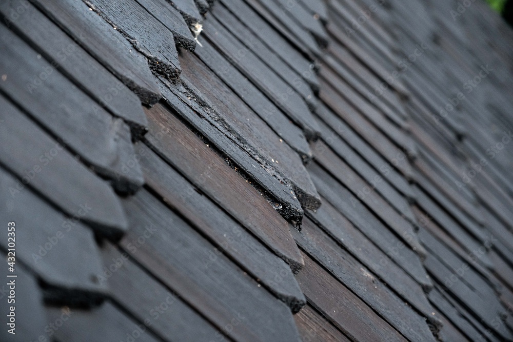 shingles on the roof. Wooden roof, shingled roof. Wooden tile. Roof of ...
