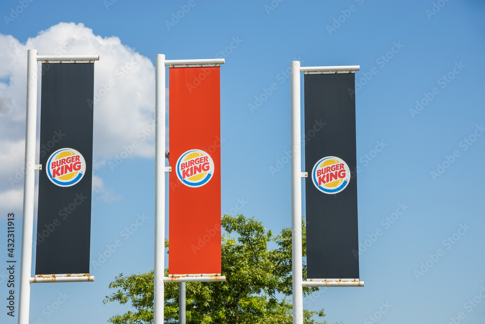 Burger King flags at the front of the fast food restaurant Stock Photo ...