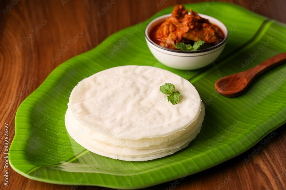 Rice pathiri Pathir flat bread with spicy chicken curry, Kerala Tamil ...