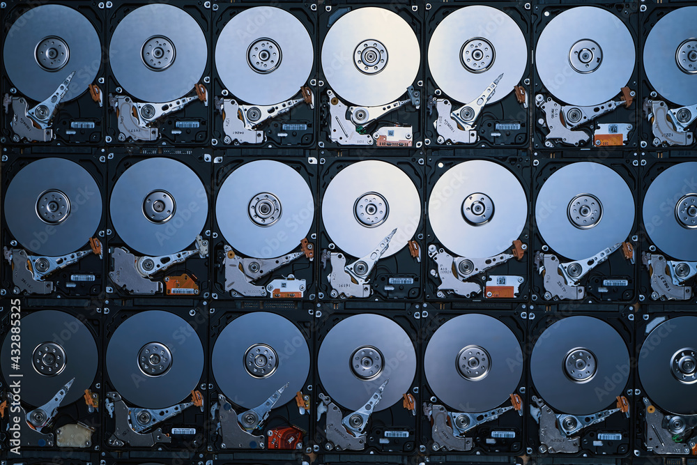 wallpaper of numbers of hard drives show inside metal disk and parts in ...