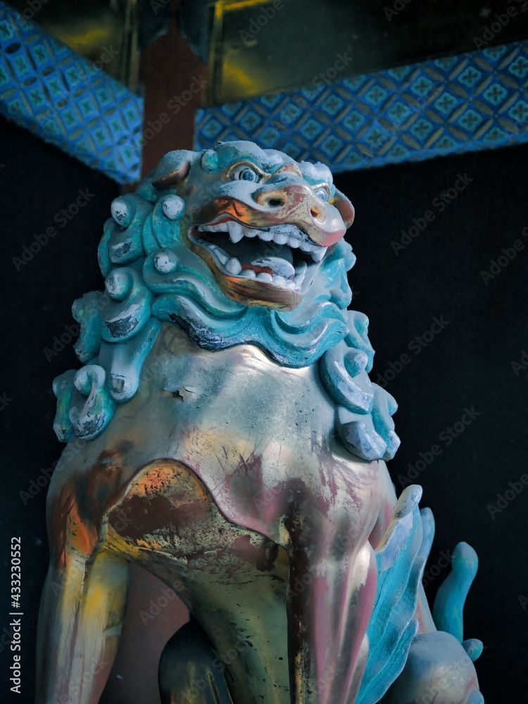 Nikko, Japan. Statue of a guardian lion-dog at Nikko Toshogu shrine ...