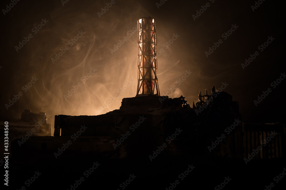Creative artwork decoration. Chernobyl nuclear power plant at night ...