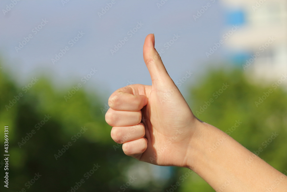 hand thumbs up sky background consent confirmation approval Stock Photo ...