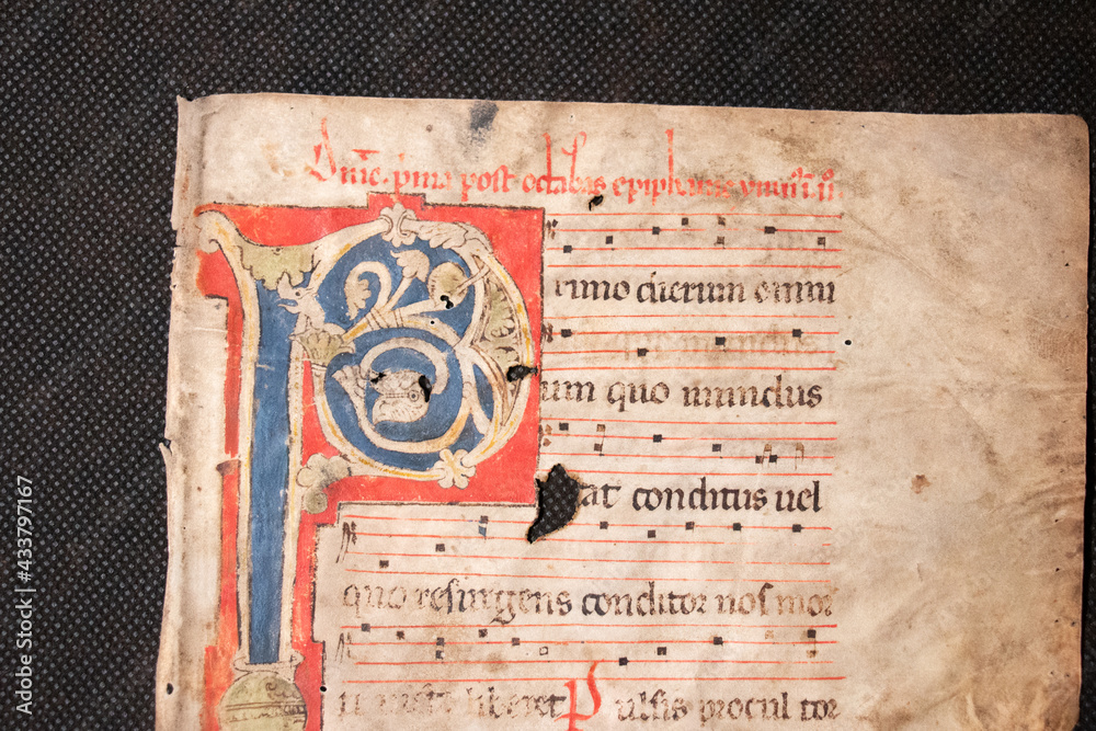 Photo Stock A medieval manuscript hand written onto parchment or vellum ...